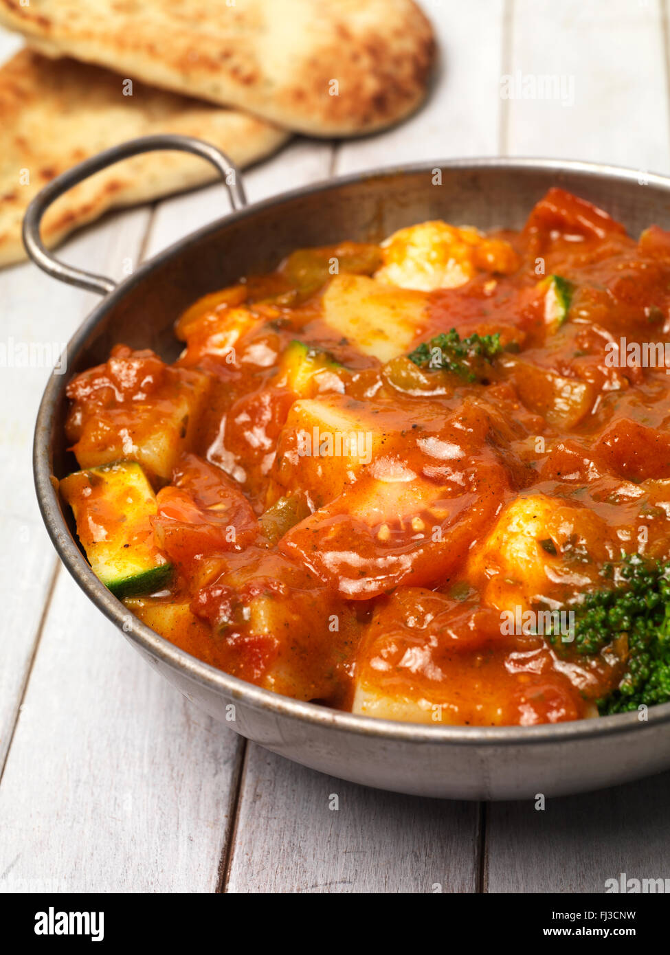Curry on a table top Stock Photo - Alamy