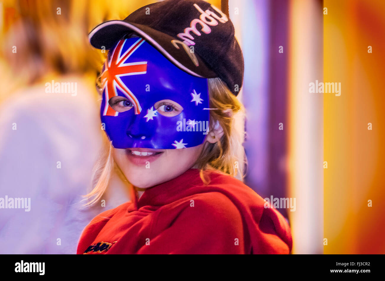 Young girl wearing Australian flag mask at Flinders Street Station ...