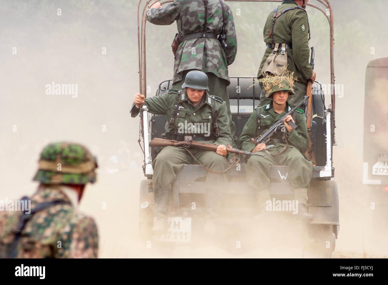 Second world war re-enactment. German soldiers retreating after mock ...