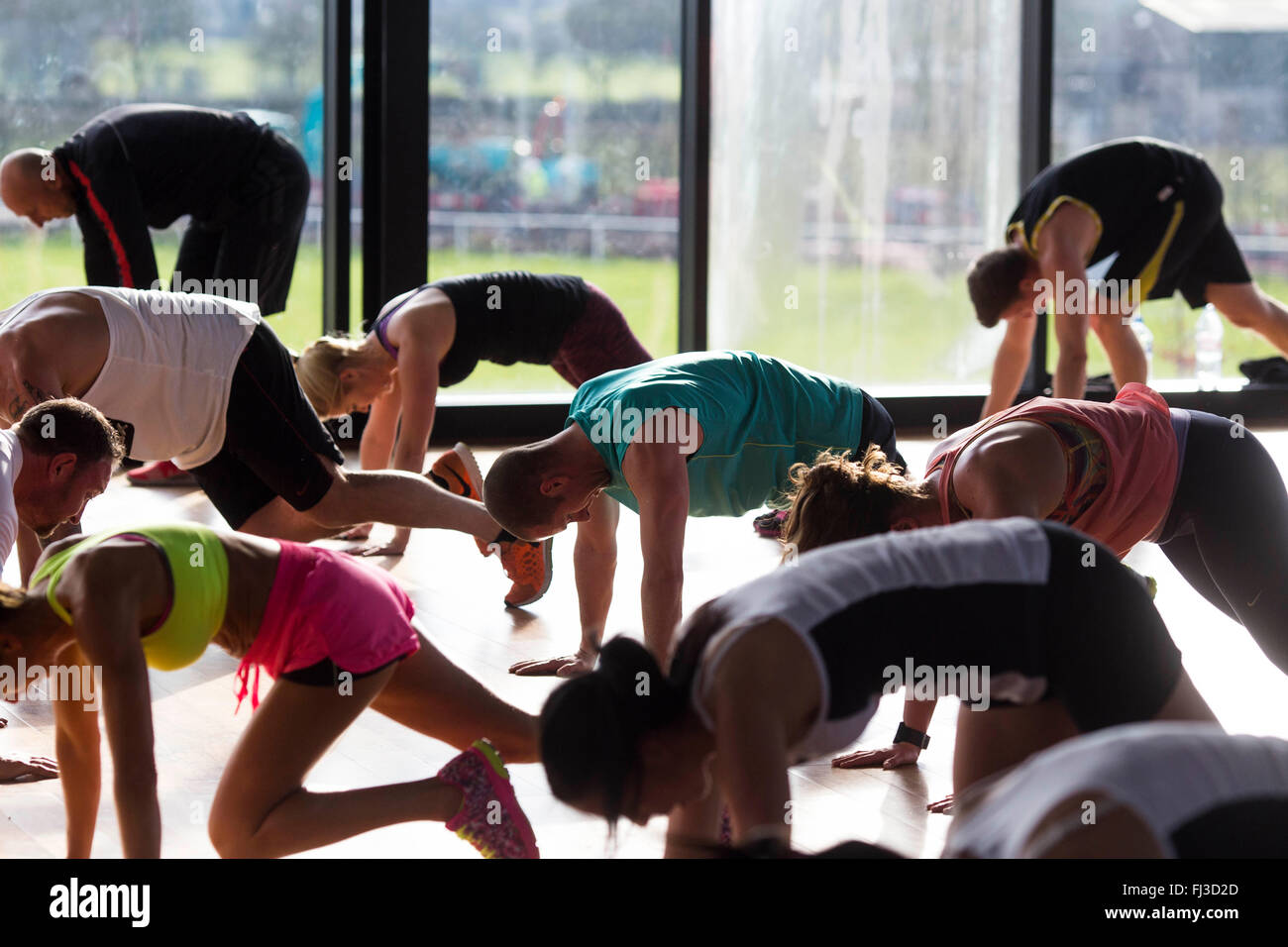 group exercise session in a gym Stock Photo - Alamy