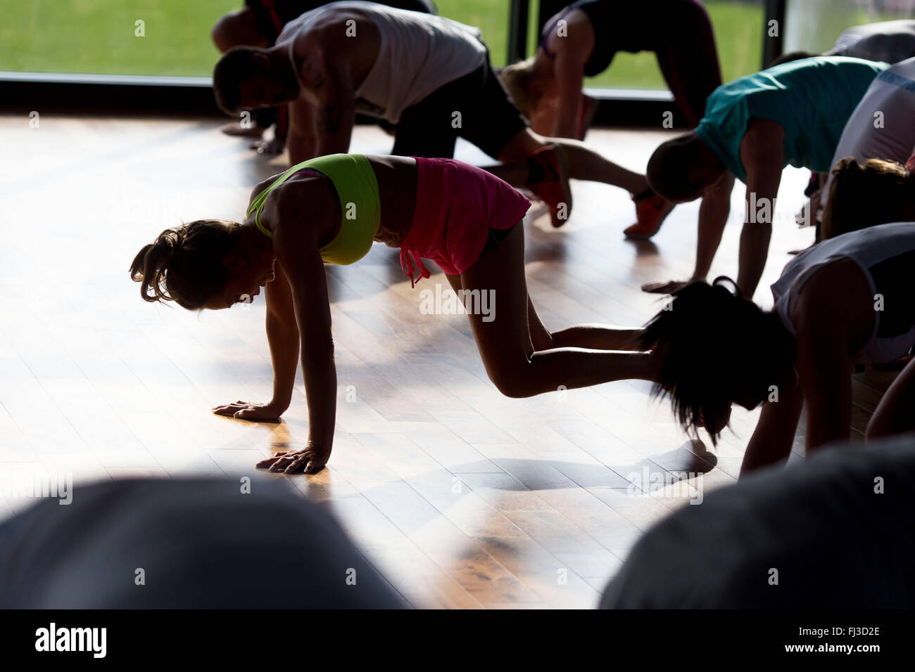 group exercise session in a gym Stock Photo - Alamy