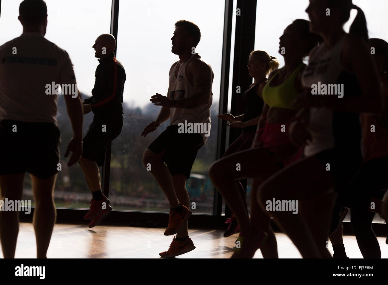 group exercise session in a gym Stock Photo - Alamy