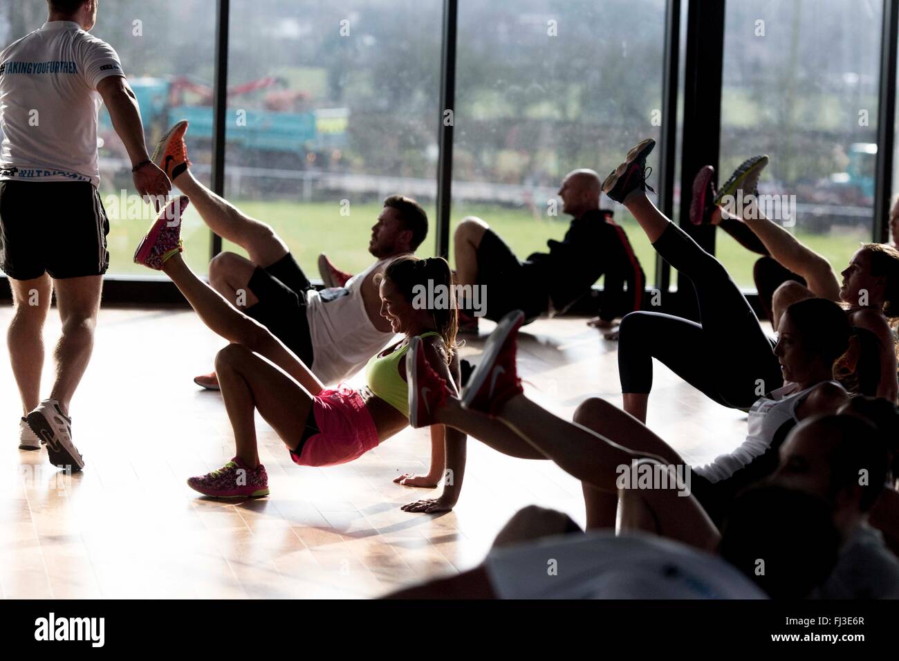 group exercise session in a gym Stock Photo - Alamy