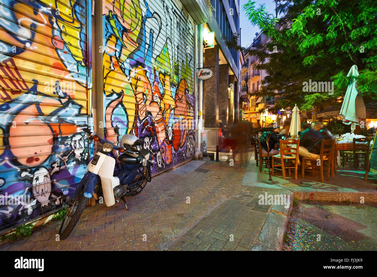 Graffiti and coffee shop in Psirri neighborhood in Heroes' square ...