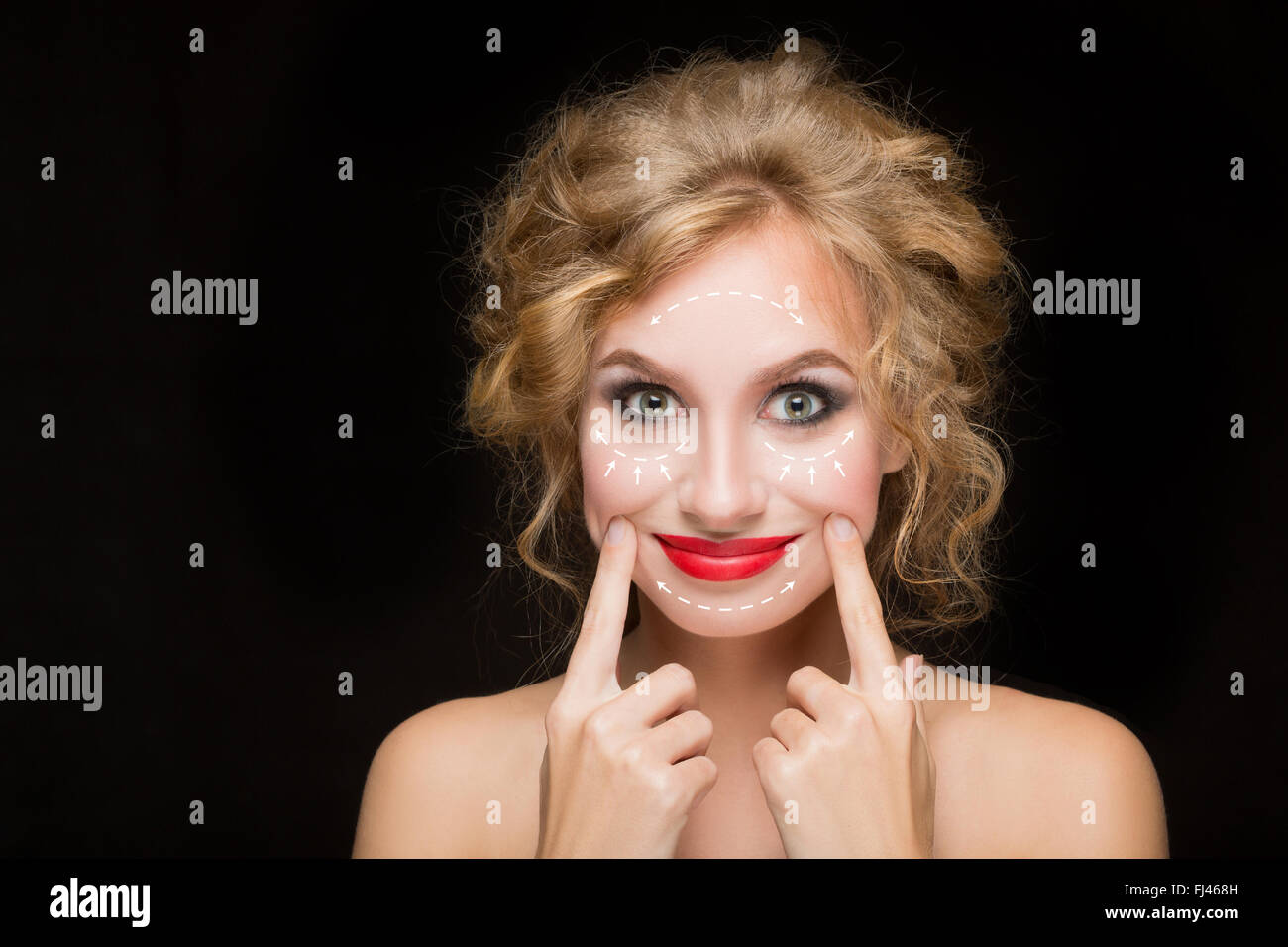 Portrait of young woman with arrows on her face Stock Photo - Alamy