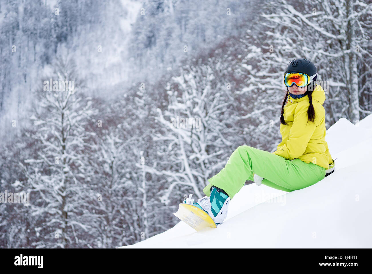 Portrait of snowboarder woman Stock Photo - Alamy