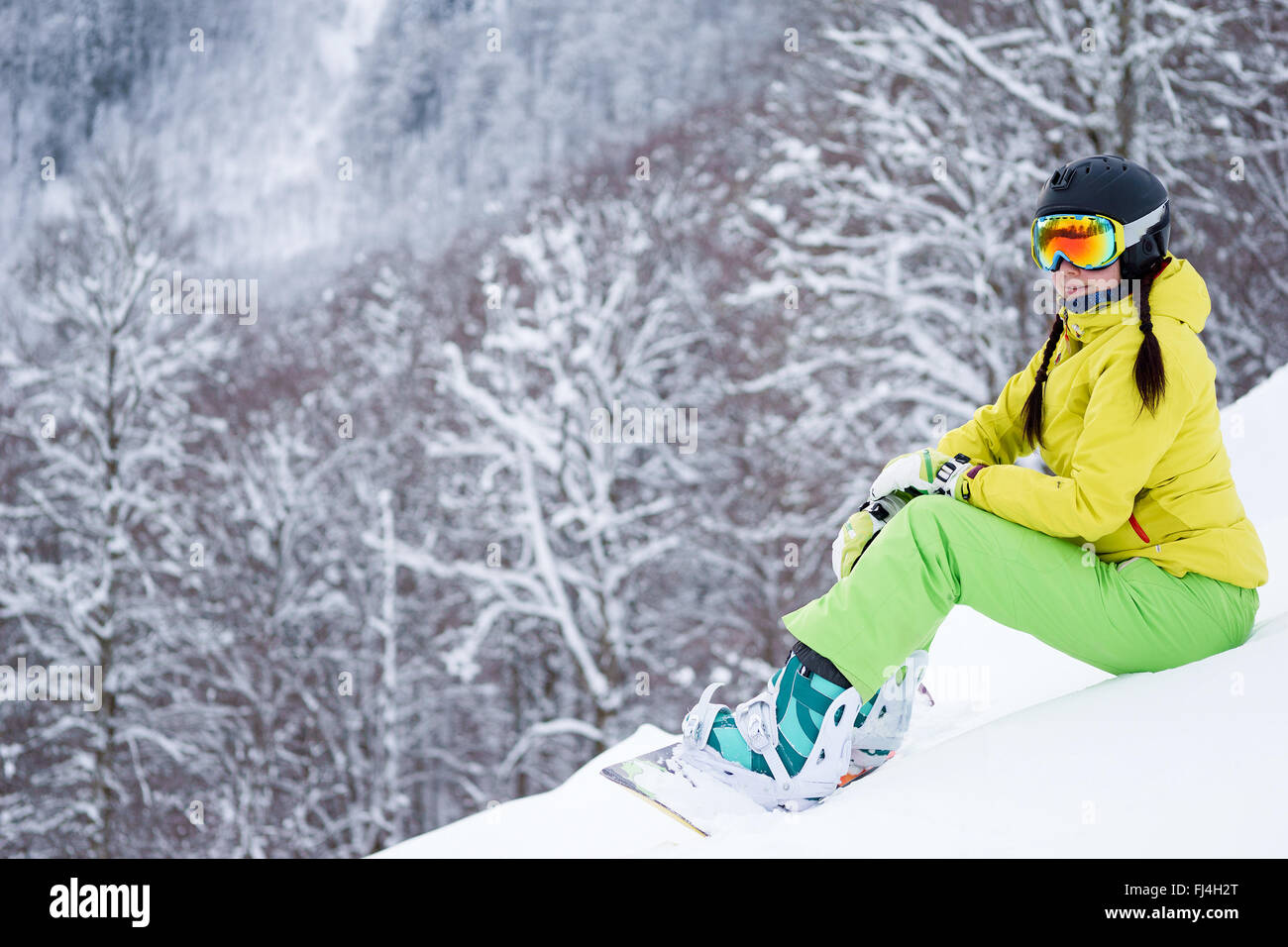Portrait of snowboarder woman Stock Photo - Alamy