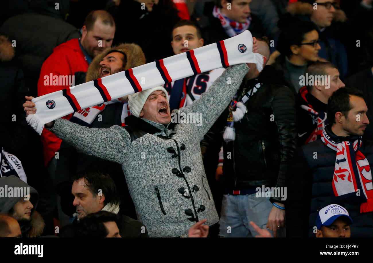 A PSG fan sings during the UEFA Champions League round of 16 match ...