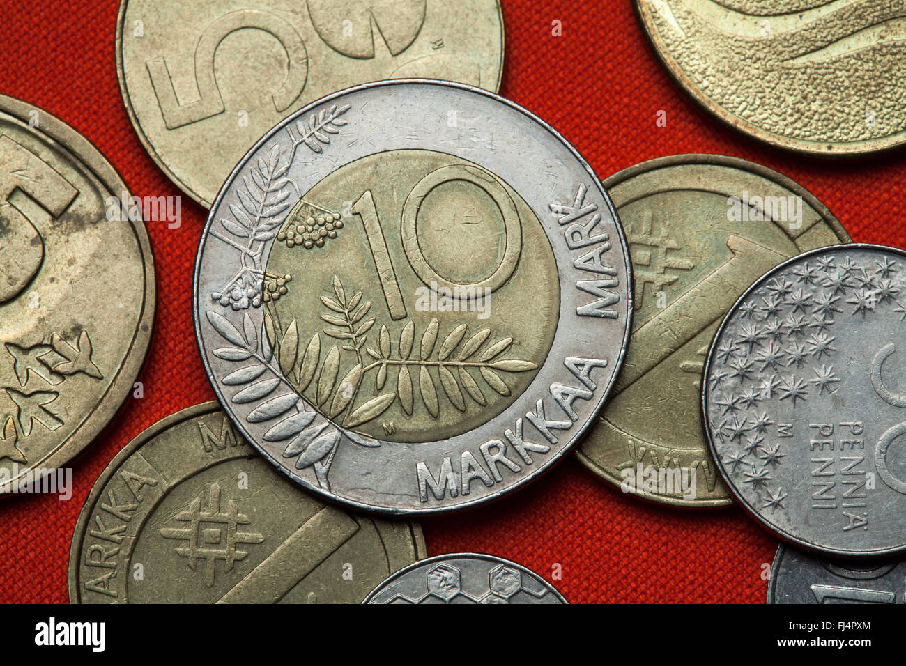 Coins of Finland. Rowan tree branches and berries depicted in the ...