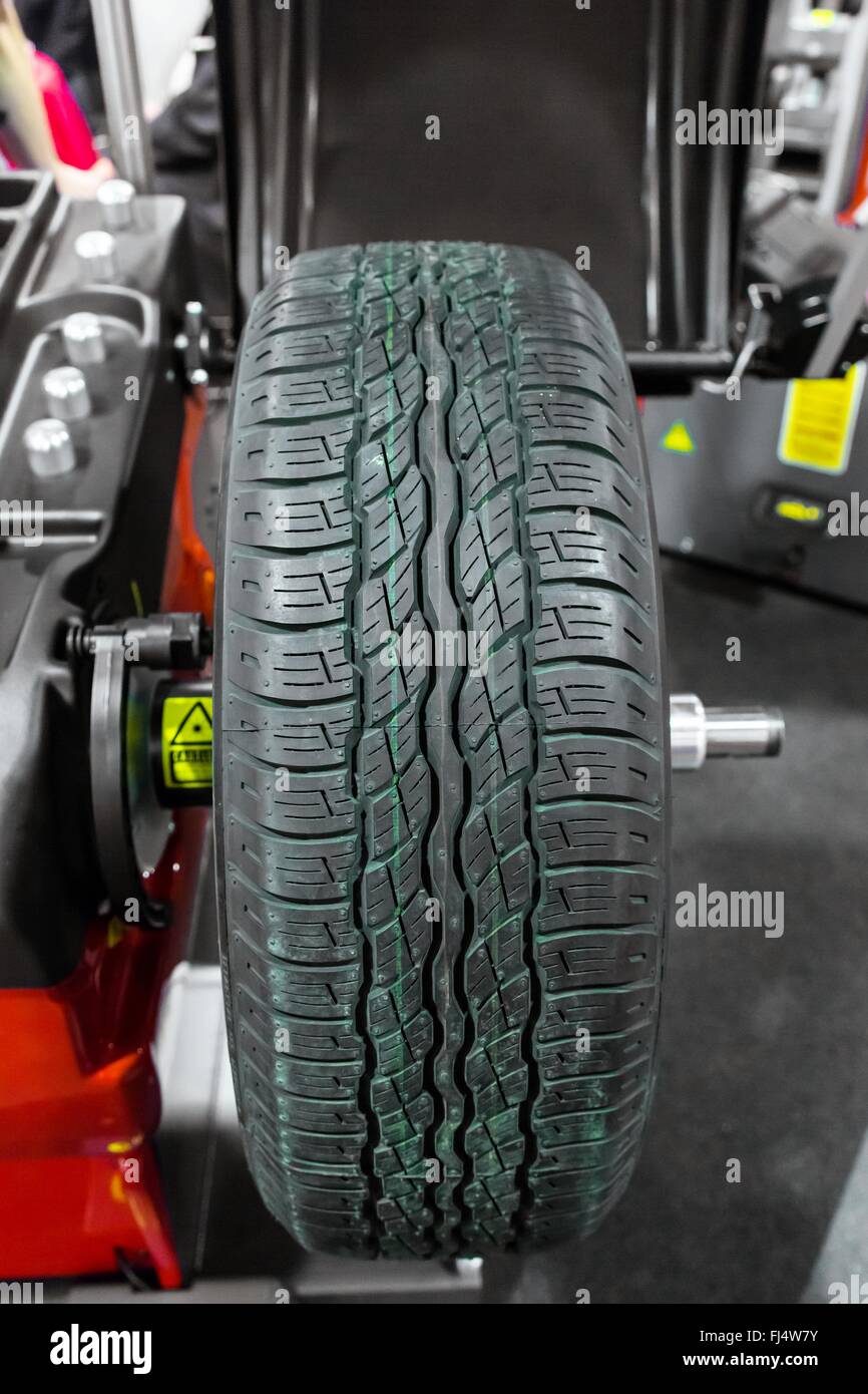 Wheel balancing close up Stock Photo - Alamy