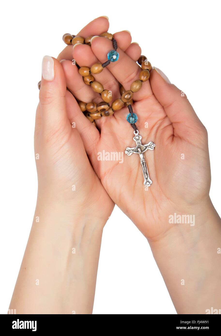 Young women's hand with wooden rosary isolated on white background ...