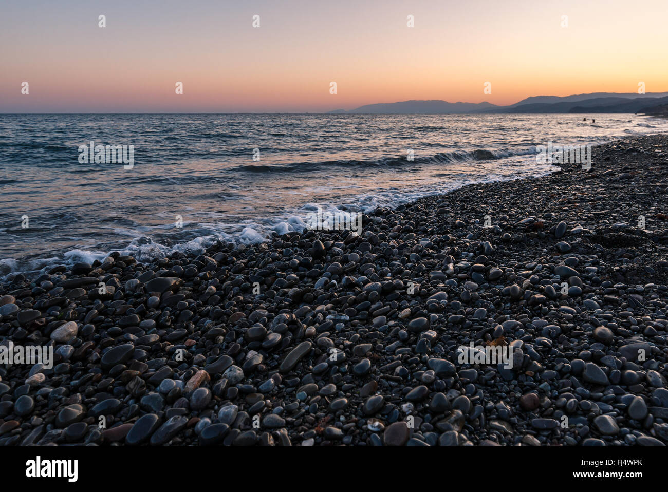 beautiful peach sunset on the sea coast Stock Photo - Alamy