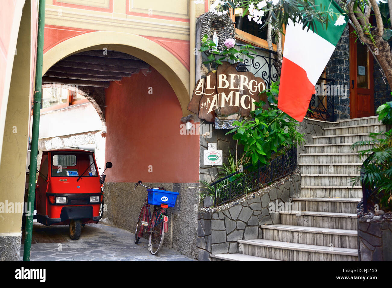Typical street at Monterosso al Mare village in famous Cinque Terre. La ...
