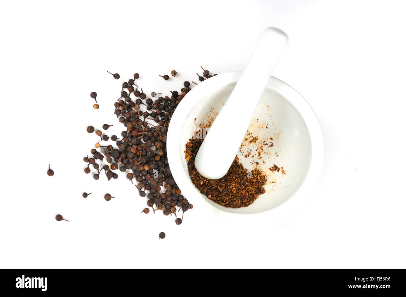 Cubeb pepper, Tailed Pepper (Piper cubeba), dried fruits and morter ...