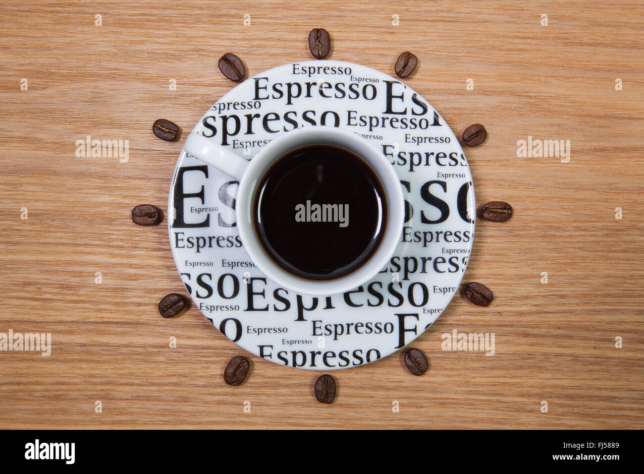Coffee Time - Cup of coffee and clock of coffee beans Stock Photo - Alamy