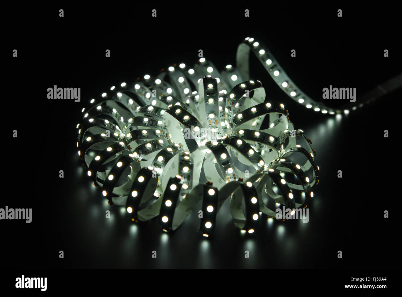 Included led strip on the black background Stock Photo - Alamy