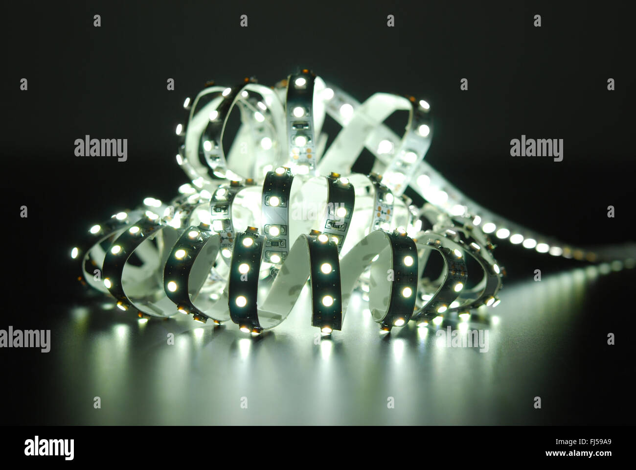 Included led strip on the black background Stock Photo - Alamy