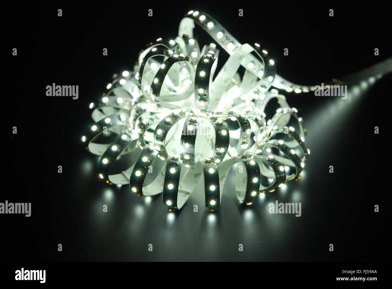 Included led strip on the black background Stock Photo - Alamy