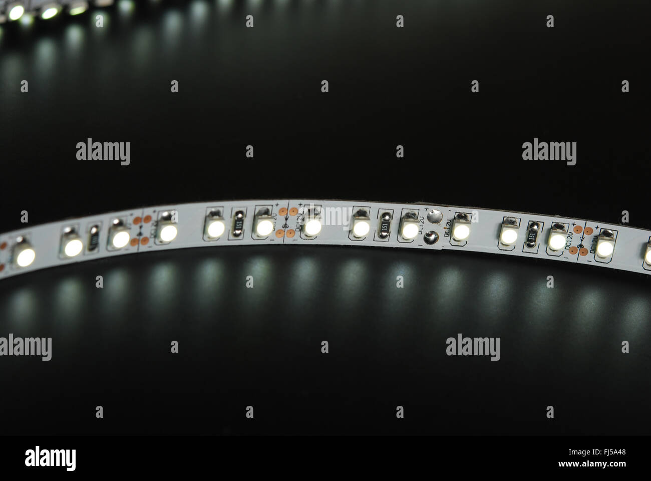 Included led strip on the black background Stock Photo - Alamy