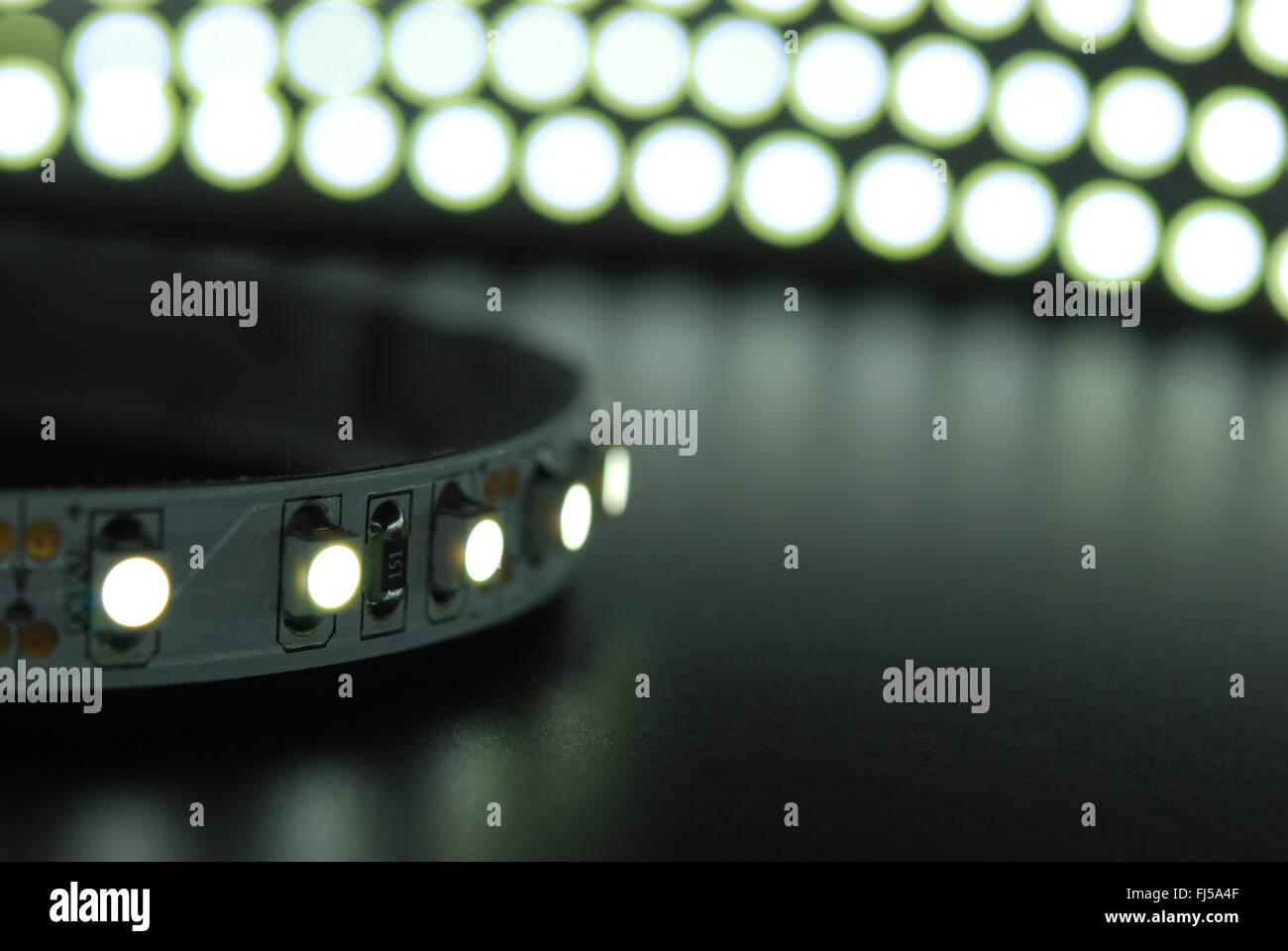 White led strip on the black background Stock Photo - Alamy