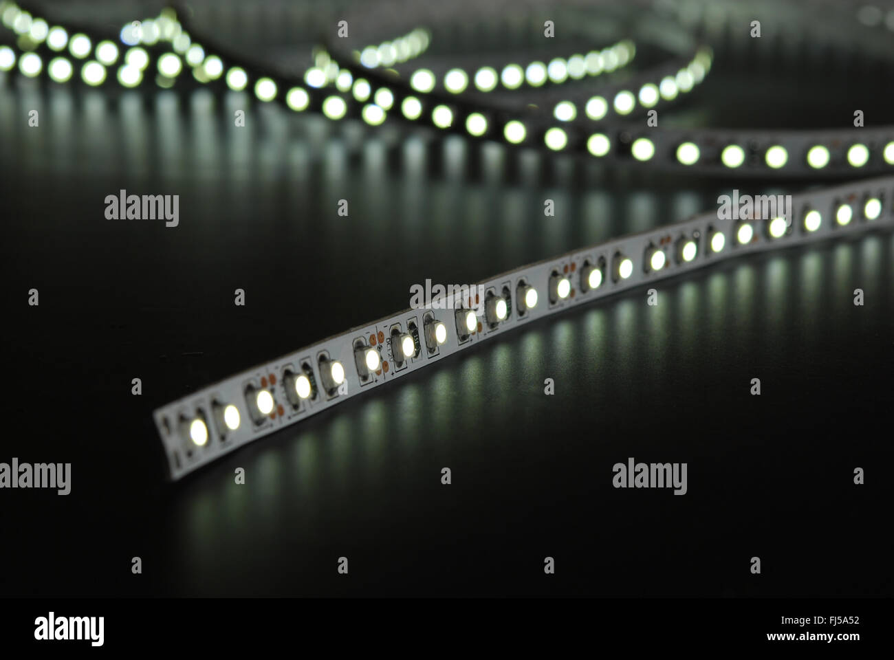 White led strip on the black background Stock Photo - Alamy