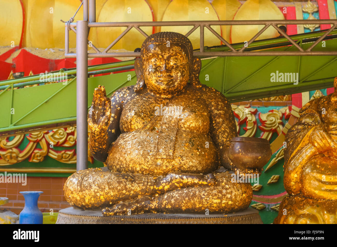 Golden statue of Budha in the Budhist Temple in Thailand Stock Photo ...