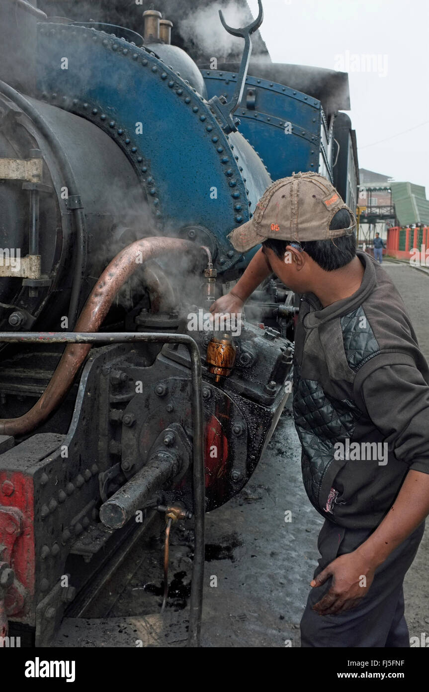 Engineer inspecting Darjeeling Himalayan Railway B-Class steam ...