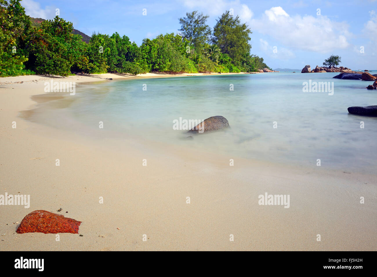beach and granite rocks at Anse Possession, Seychelles, Praslin Stock ...