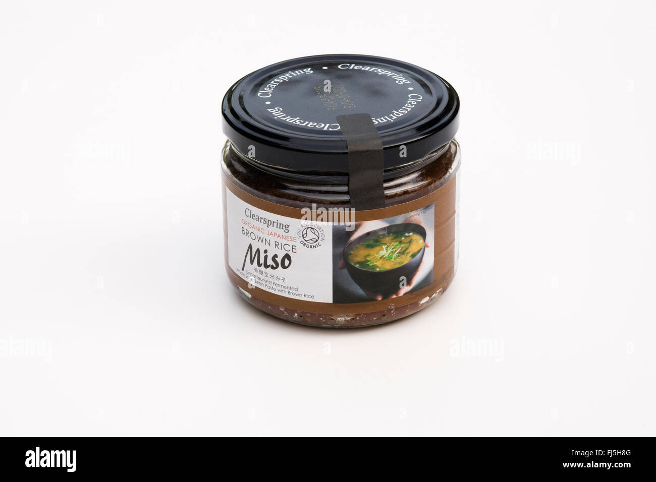 Jar of Miso paste on a white background Stock Photo - Alamy