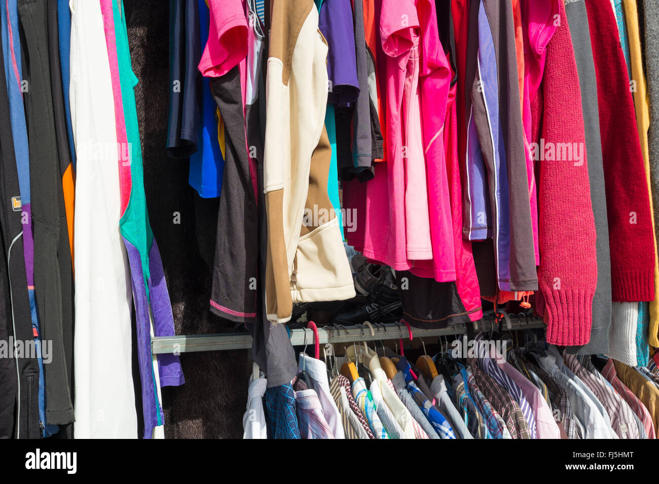 Assorted second hand clothes on a street market Stock Photo - Alamy