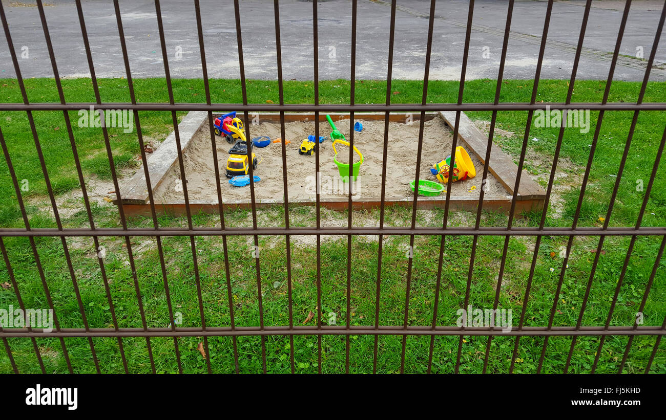 sand box behind a paling, Germany Stock Photo - Alamy