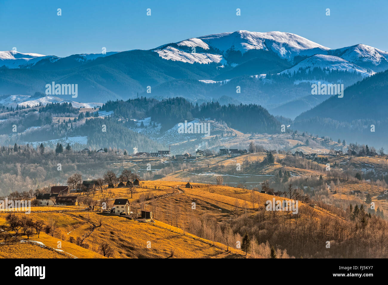Rural mountain landscape with remote Romanian village uphill in the ...