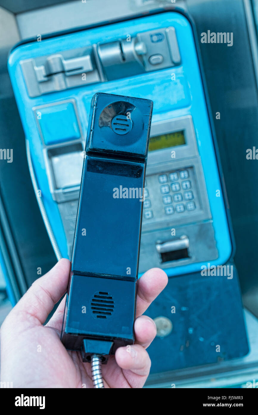 Old public phone still in workind condition Stock Photo - Alamy