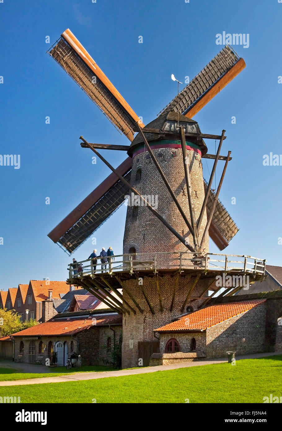 group of tourists at the Kriemhild Mill in Xanten, Germany, North Rhine ...