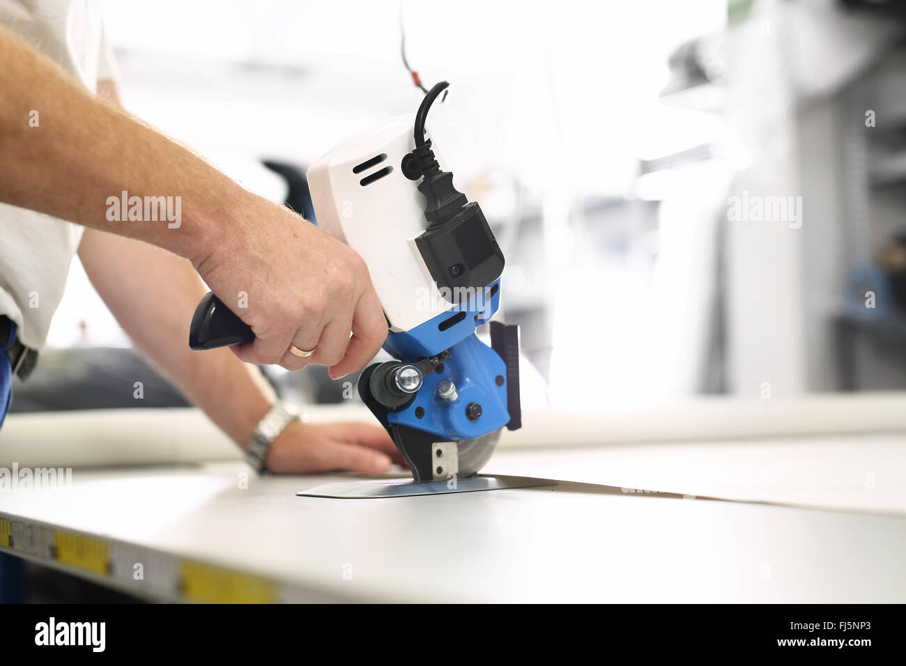 Sewing machine. Sewing. Sewing machine. Seamstress sewing on the sewing ...