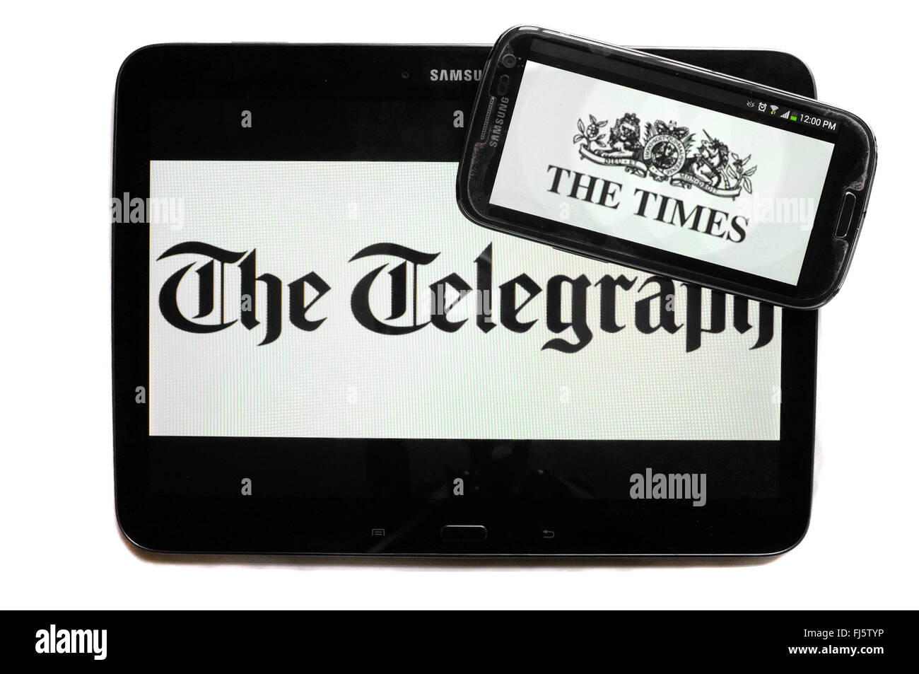 The logos of The Telegraph and The Times newspapers displayed on the ...