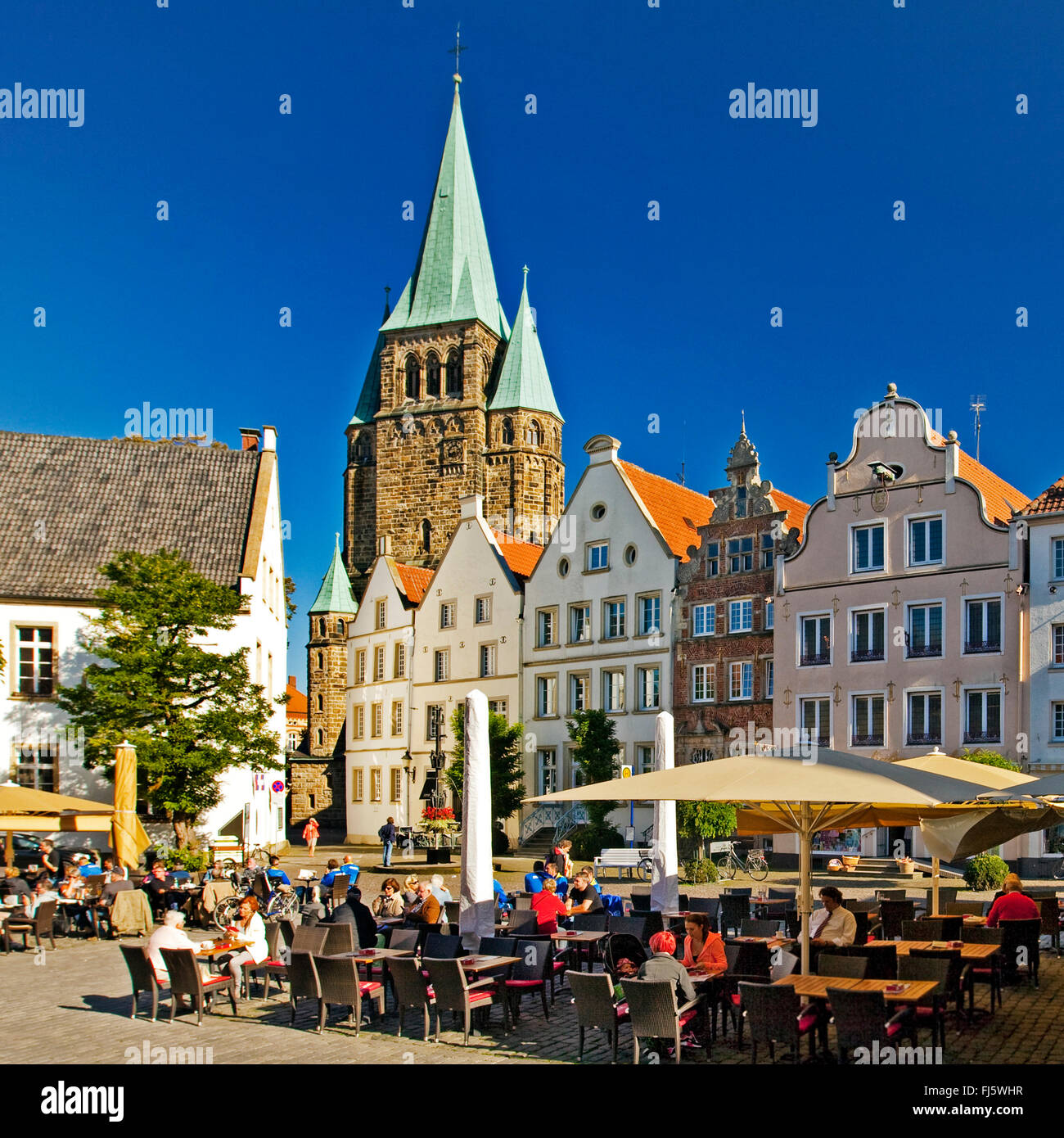 sidewalk cafe on market place and St Laurentius church in background ...