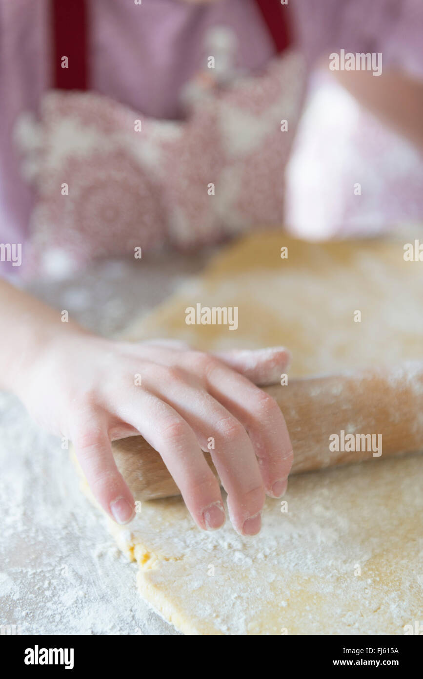 A child baking cakes. Rolling pastry Stock Photo - Alamy
