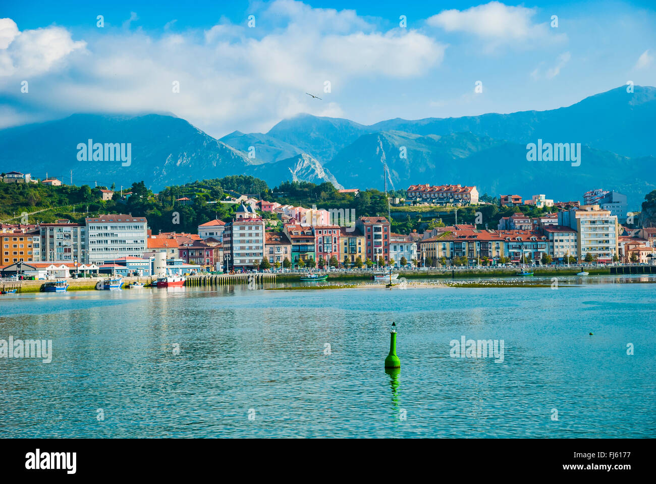 Sella River estuary, in the background, the town of Ribadesella ...