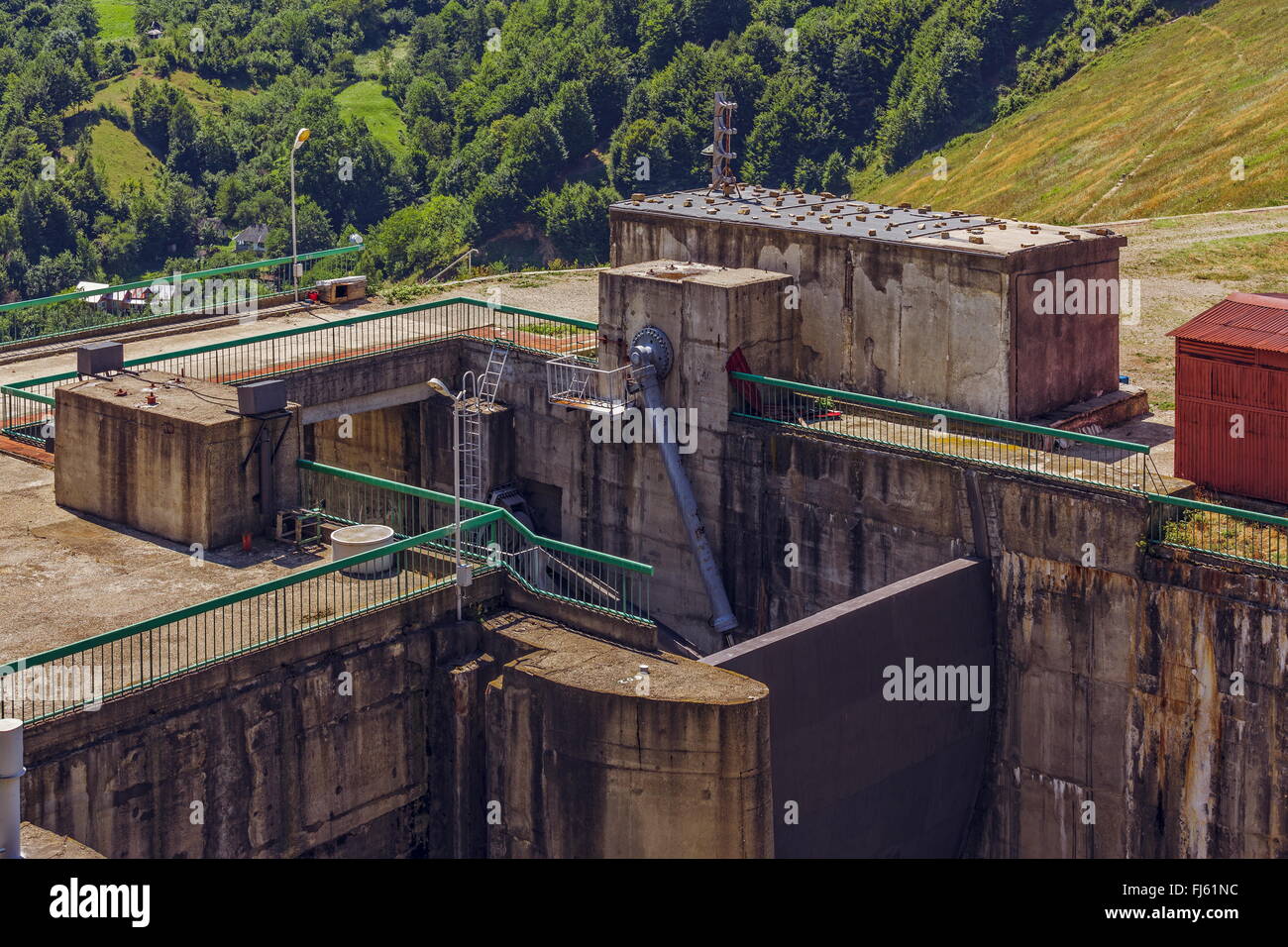 Close view of sluice gate hydraulic mechanism of a hydroelectric dam ...