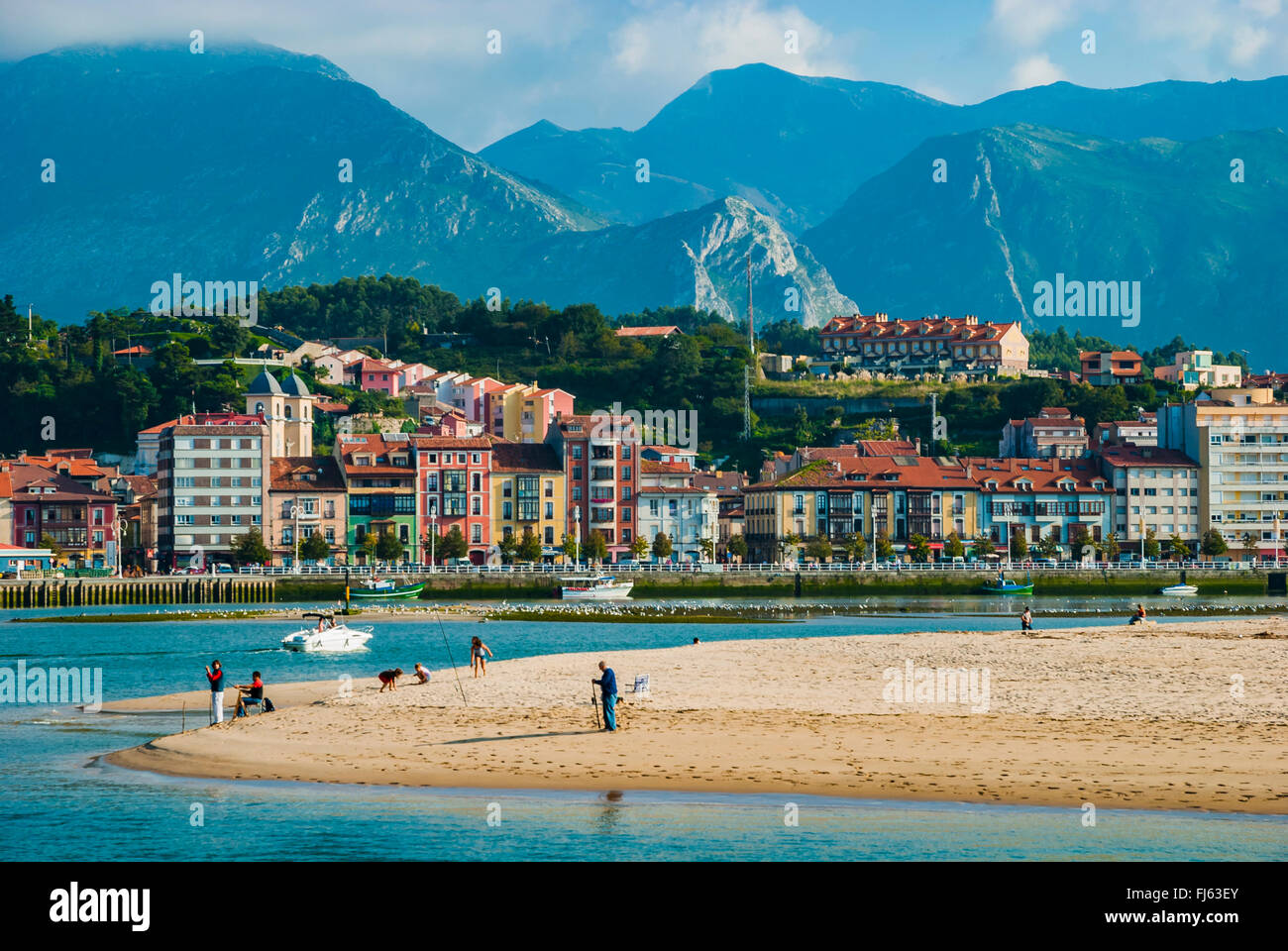 Sella River estuary, in the background, the town of Ribadesella ...