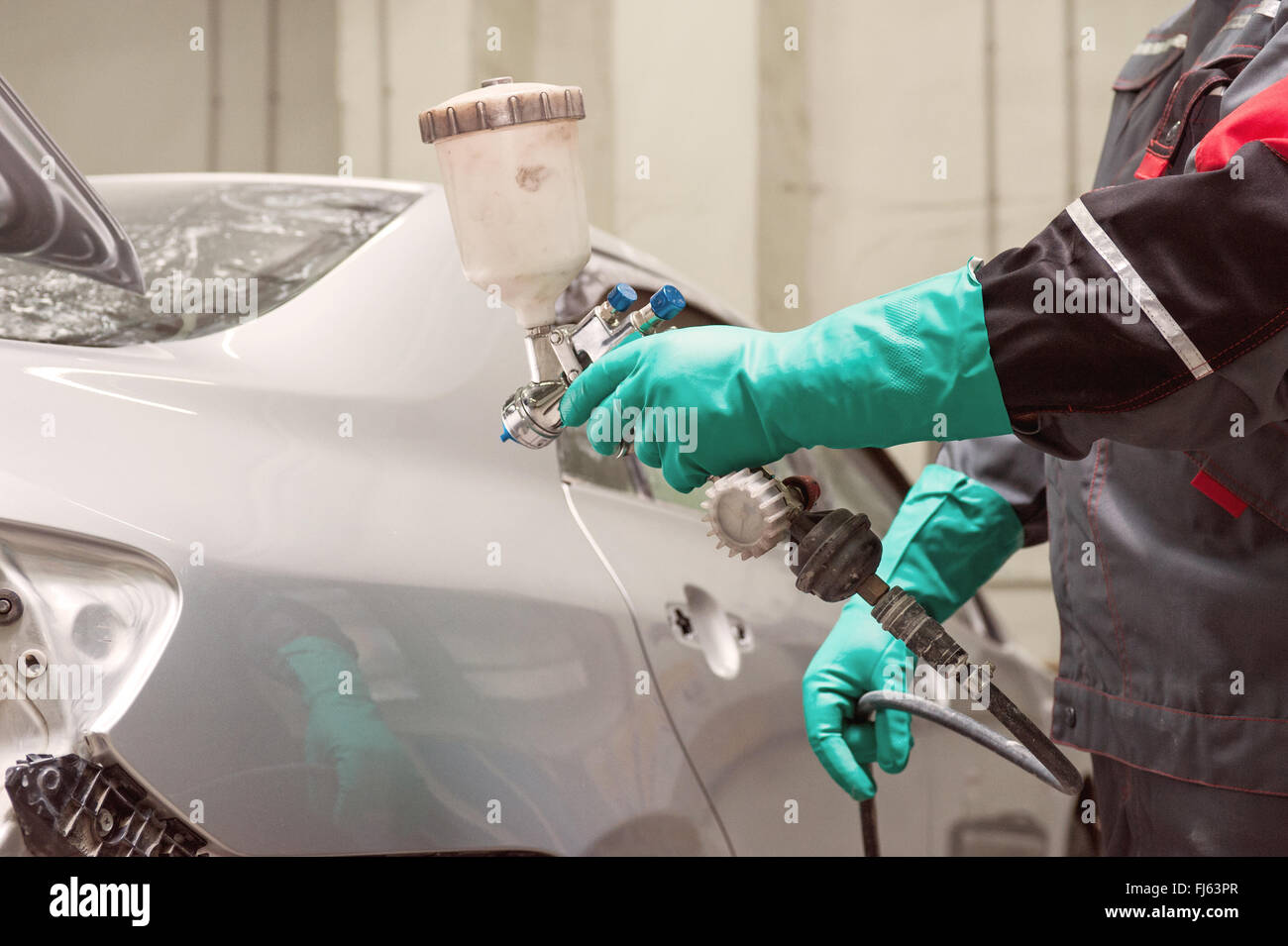 spray gun with paint for painting a car Stock Photo - Alamy