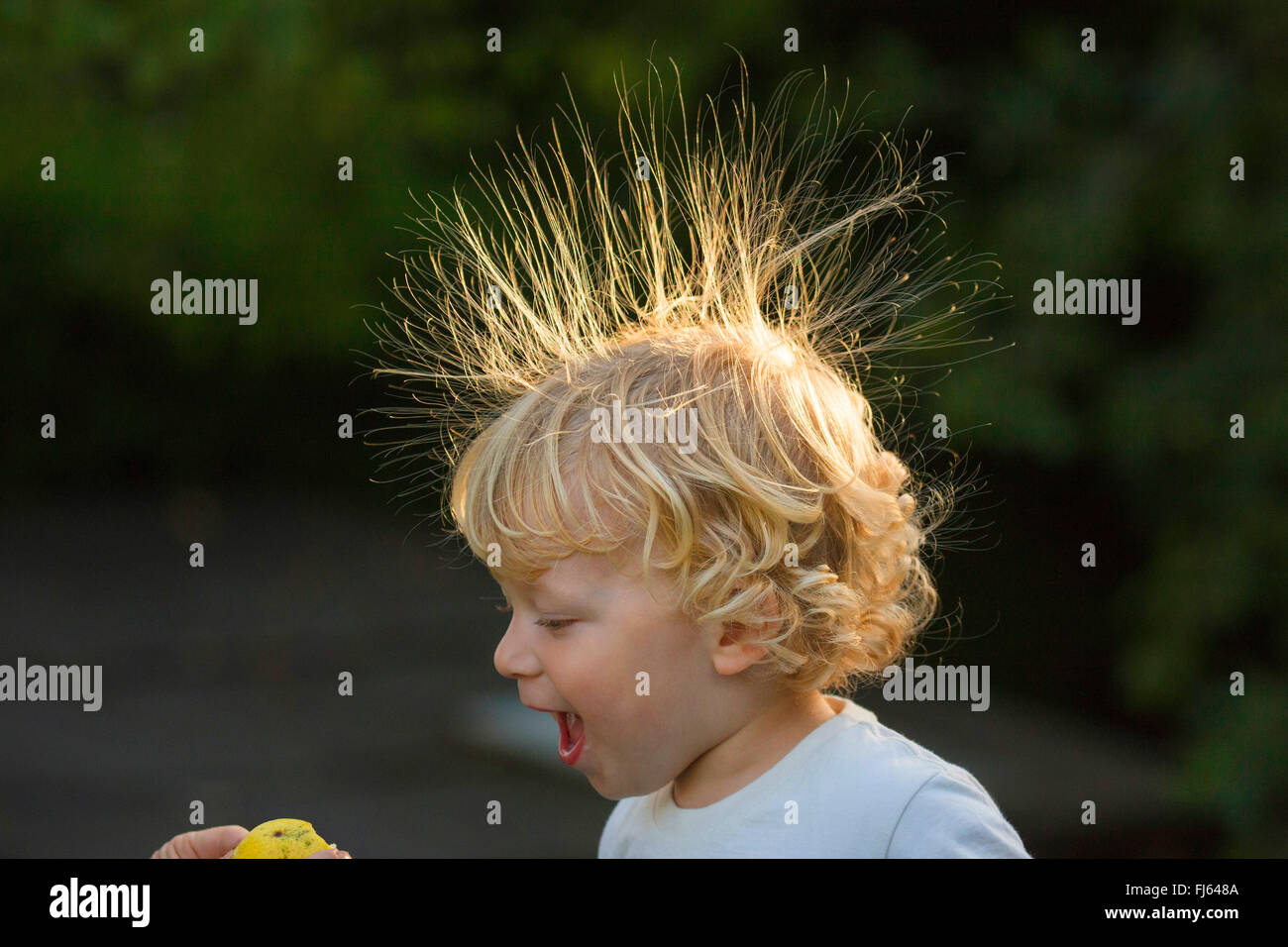 child with electrostatic charged hair Stock Photo - Alamy