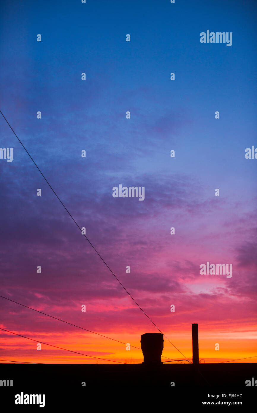 Colourful sunset seen over rooftops in the city centre of Bristol Stock ...