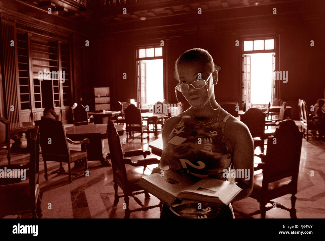 Cuban reading a book hi-res stock photography and images - Alamy