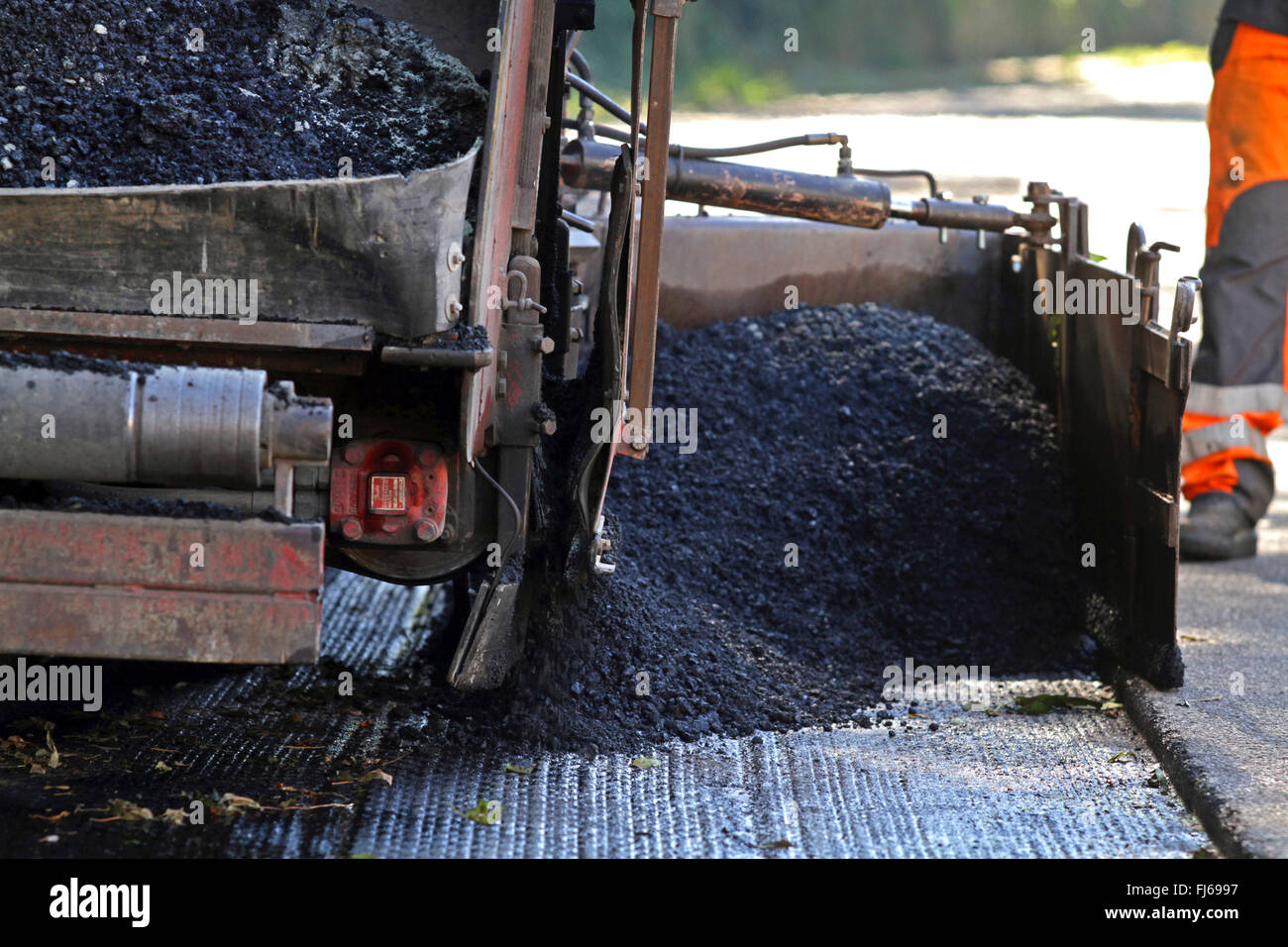 roadworks, tarmacking the road, Germany Stock Photo - Alamy
