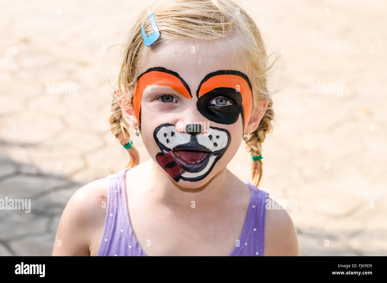 beautiful blond girl with face painting of dog Stock Photo - Alamy