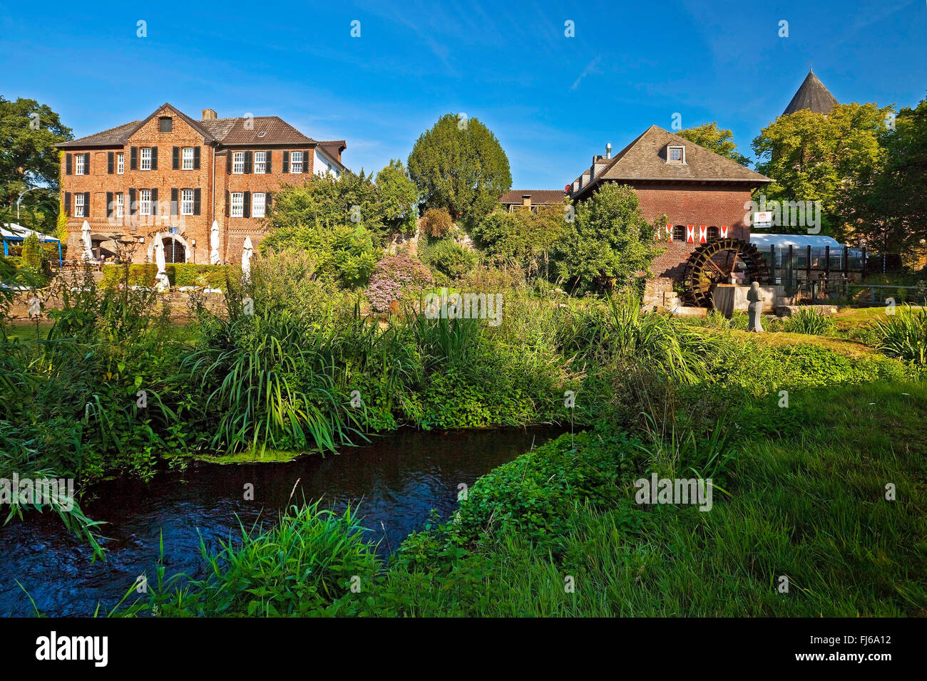 river Schwalm with mill and castle in Brueggen, Germany, North Rhine ...