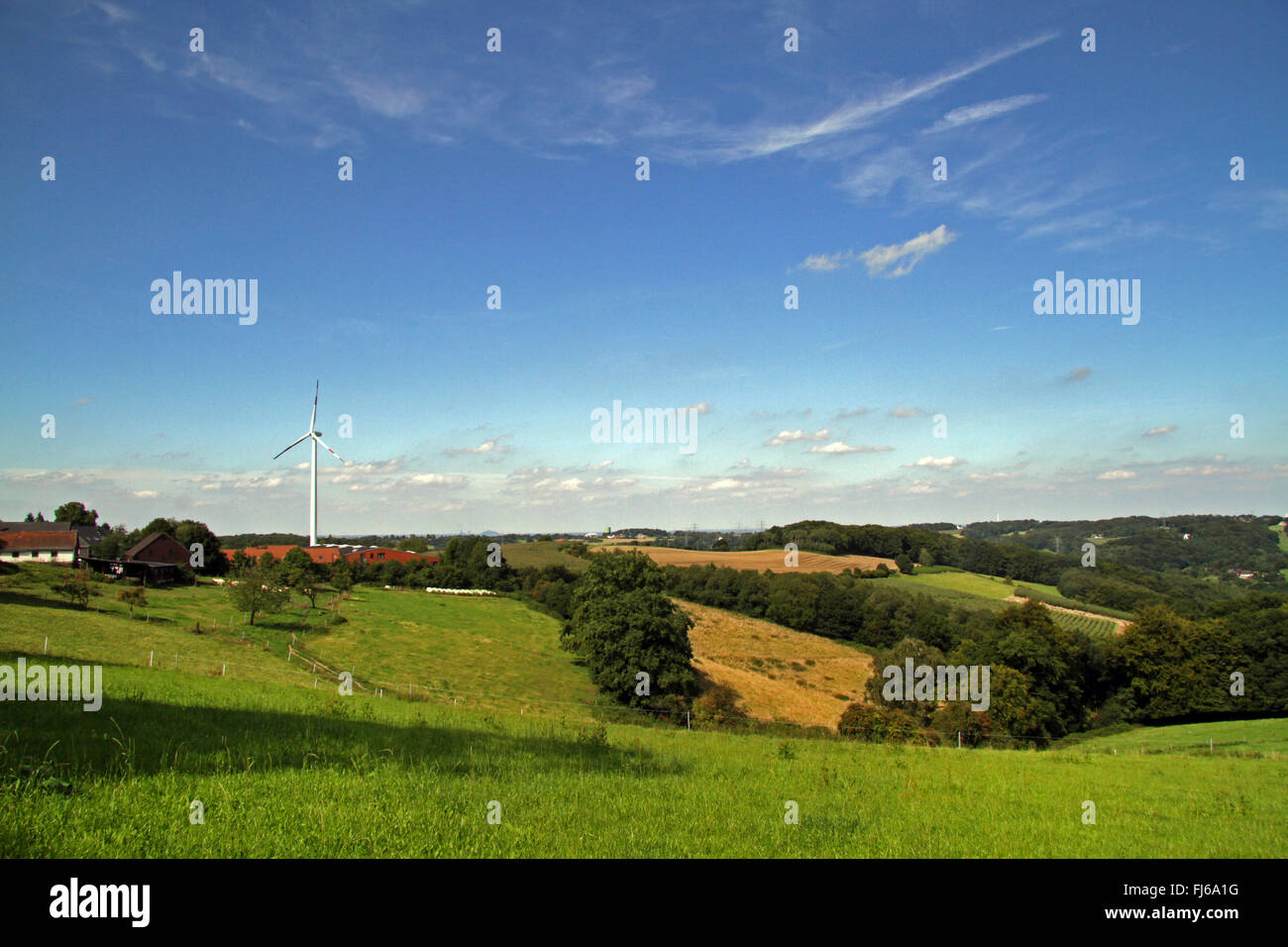 field scenery and wind wheel in summer, Germany, North Rhine-Westphalia ...