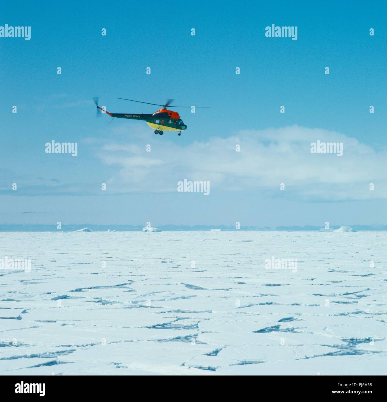 russian MI 2 helicopter flying above drift ice, Antarctica Stock Photo ...
